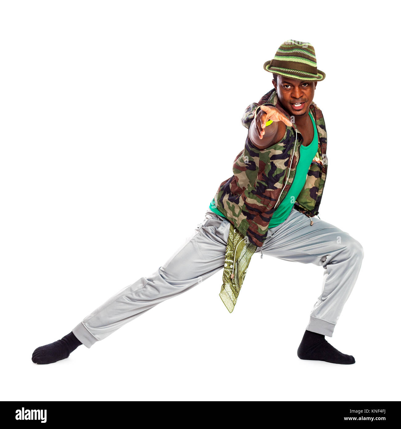 Brazilian man is posing and dancing in cool cloths with hat in front of ...