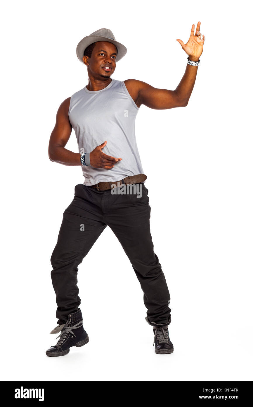 Brazilian man is posing and dancing in cool cloths with hat in front of ...