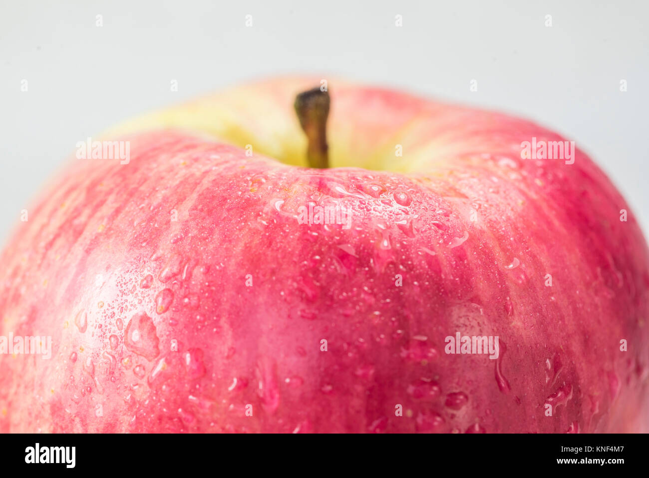 Red apple with water drops Isolaed on white background Stock Photo - Alamy