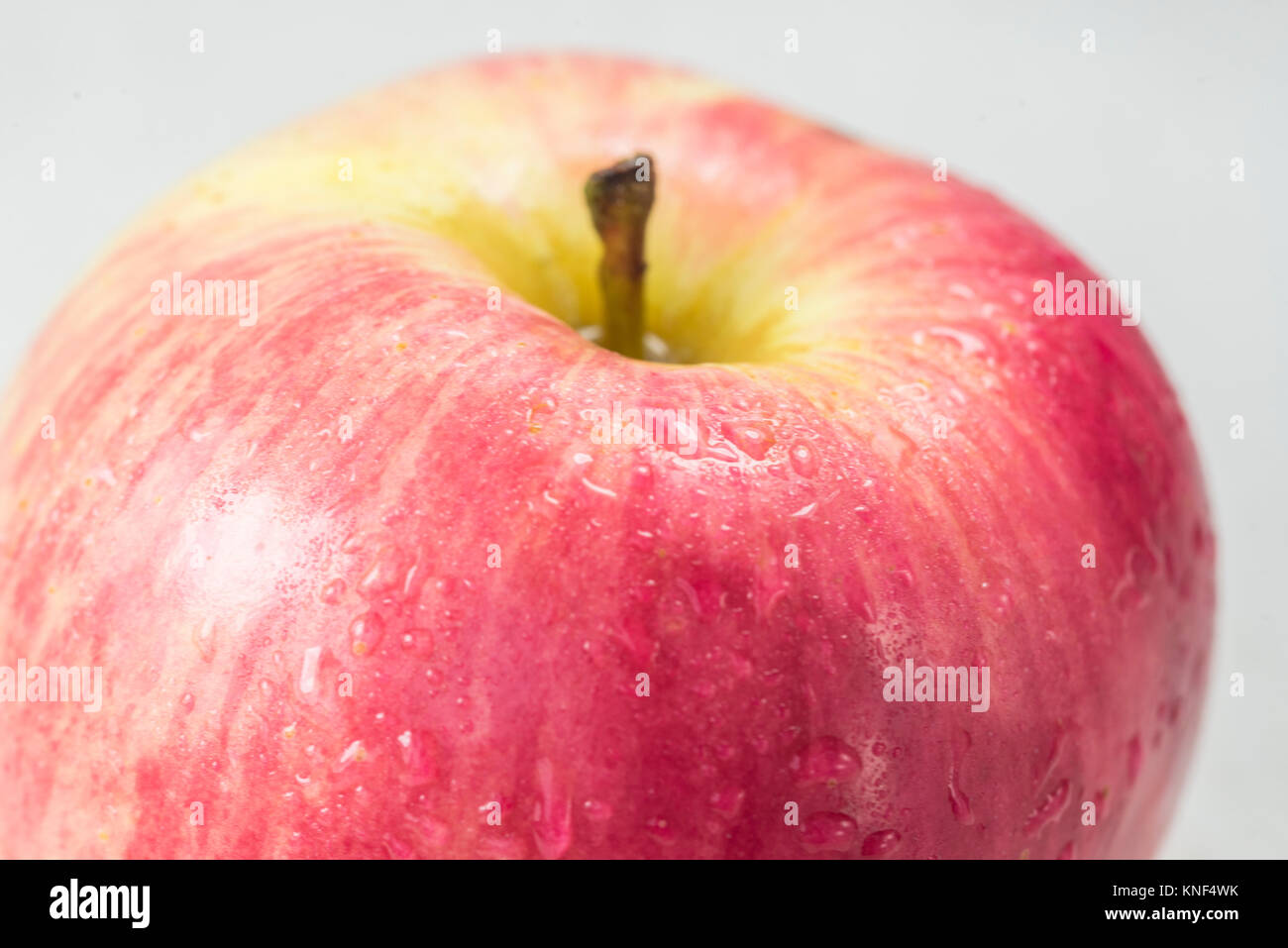 Red apple with water drops Isolaed on white background Stock Photo - Alamy