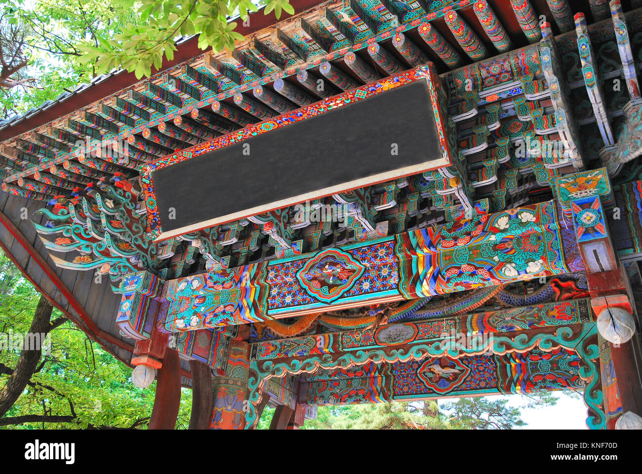 Majestic main entrance of Korean temple with inscription board and ...