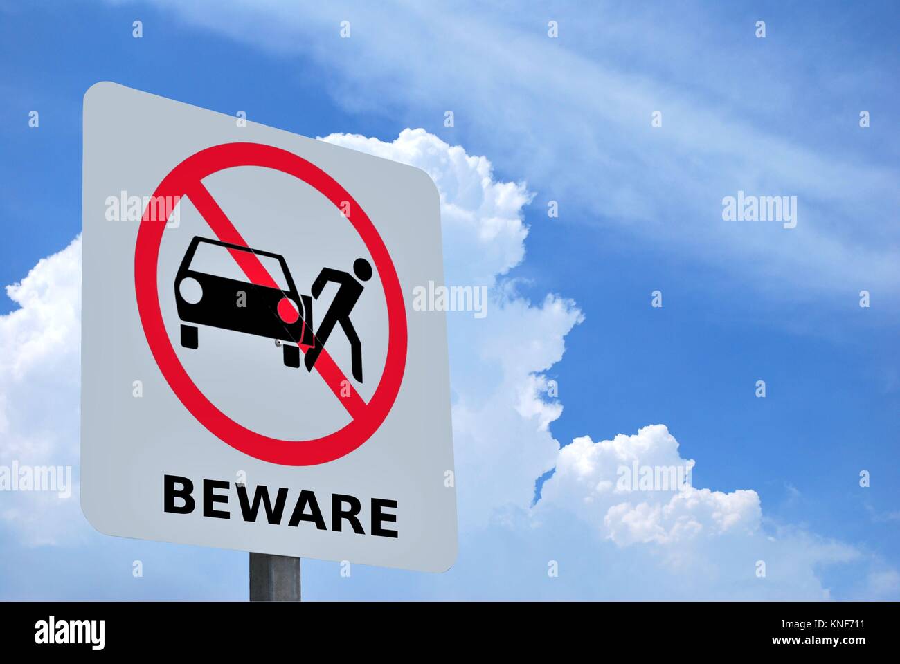 Danger warning sign or symbol on blue sky background Stock Photo - Alamy
