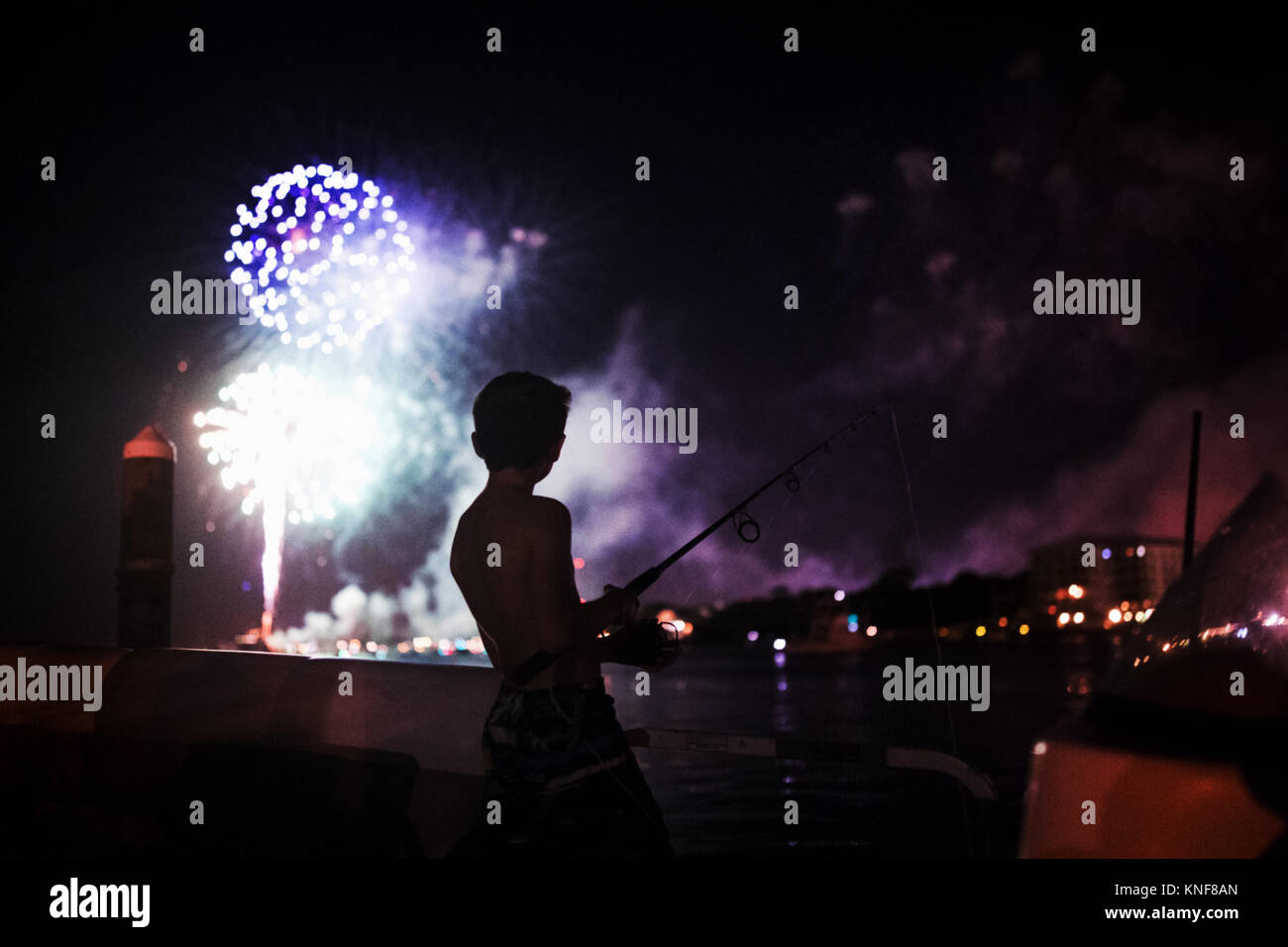 Boy fireworks hi-res stock photography and images - Alamy