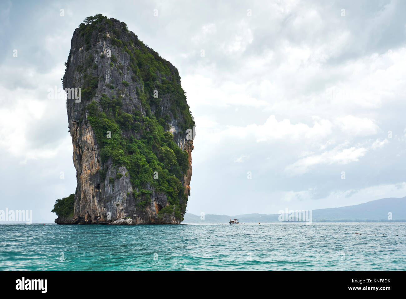 Rock formation protruding from sea, Phuket, Thailand, Asia Stock Photo ...