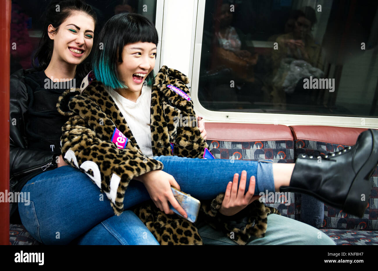 London underground people laughing hi-res stock photography and images ...