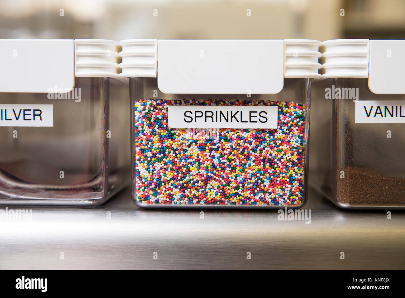 Sprinkles in labelled container Stock Photo - Alamy