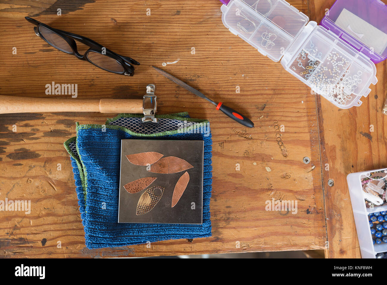 Jewellery makers tools on workbench, overhead view Stock Photo - Alamy