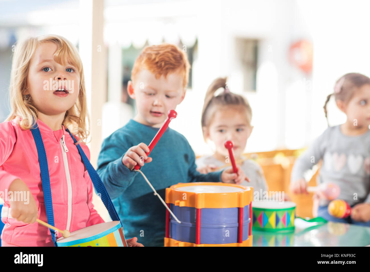 Children playing musical instruments hi-res stock photography and ...