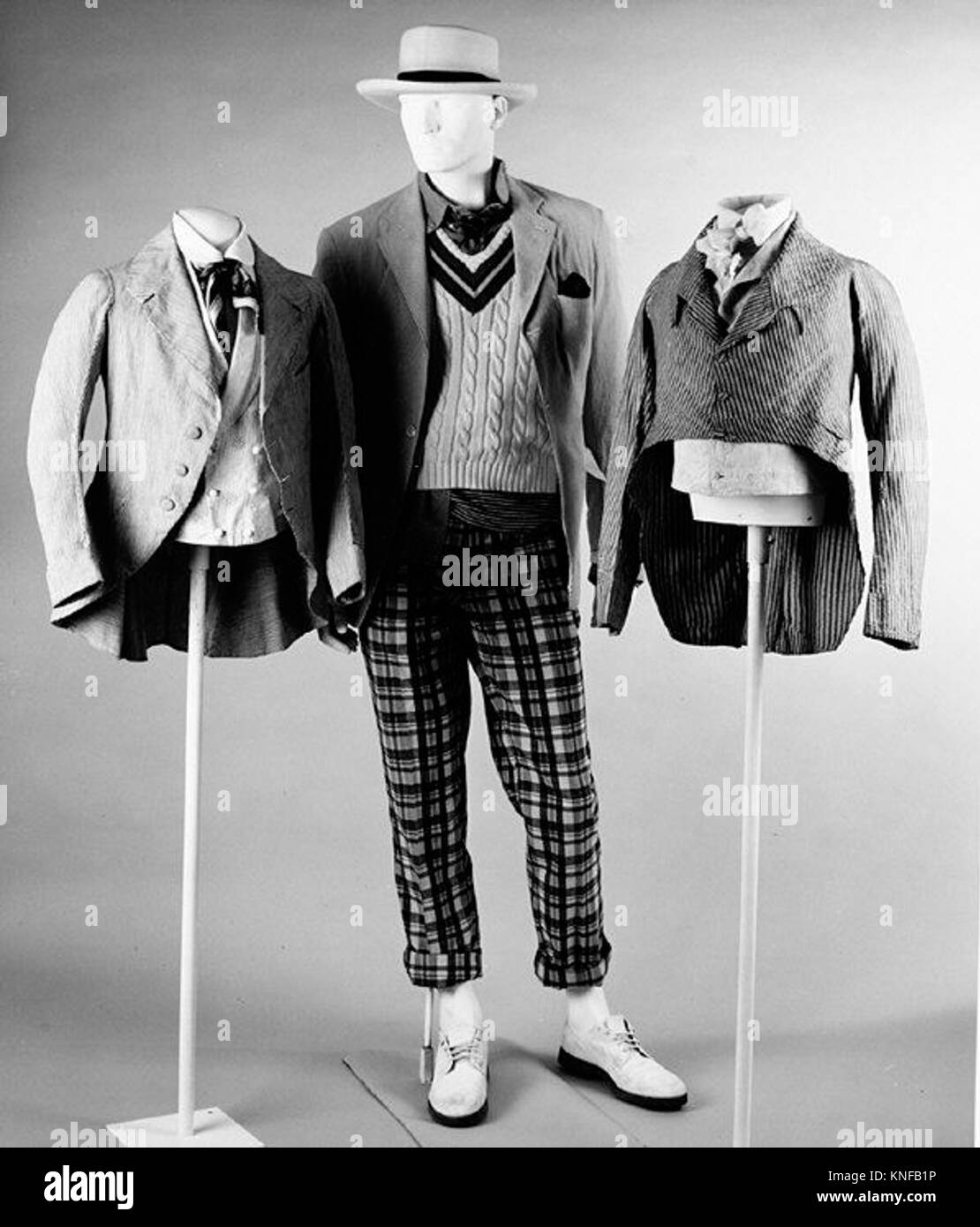 This coat, a fine example of period fashion, demonstrates the tailoring ...