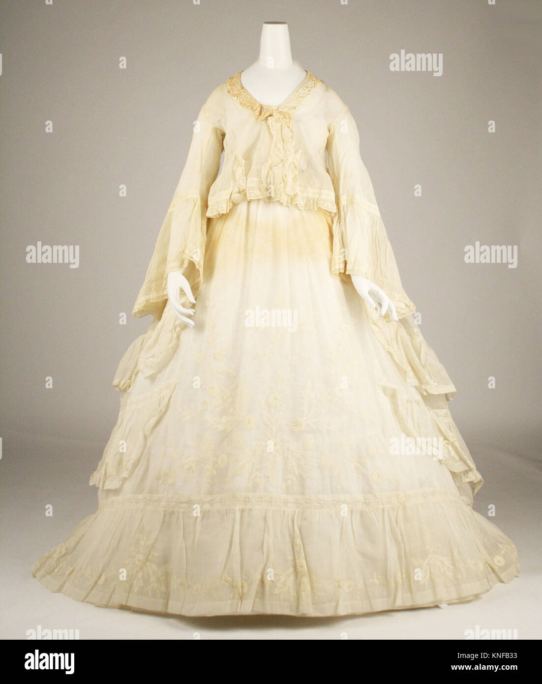 This historical dress exemplifies the fashion of its period, showcasing ...