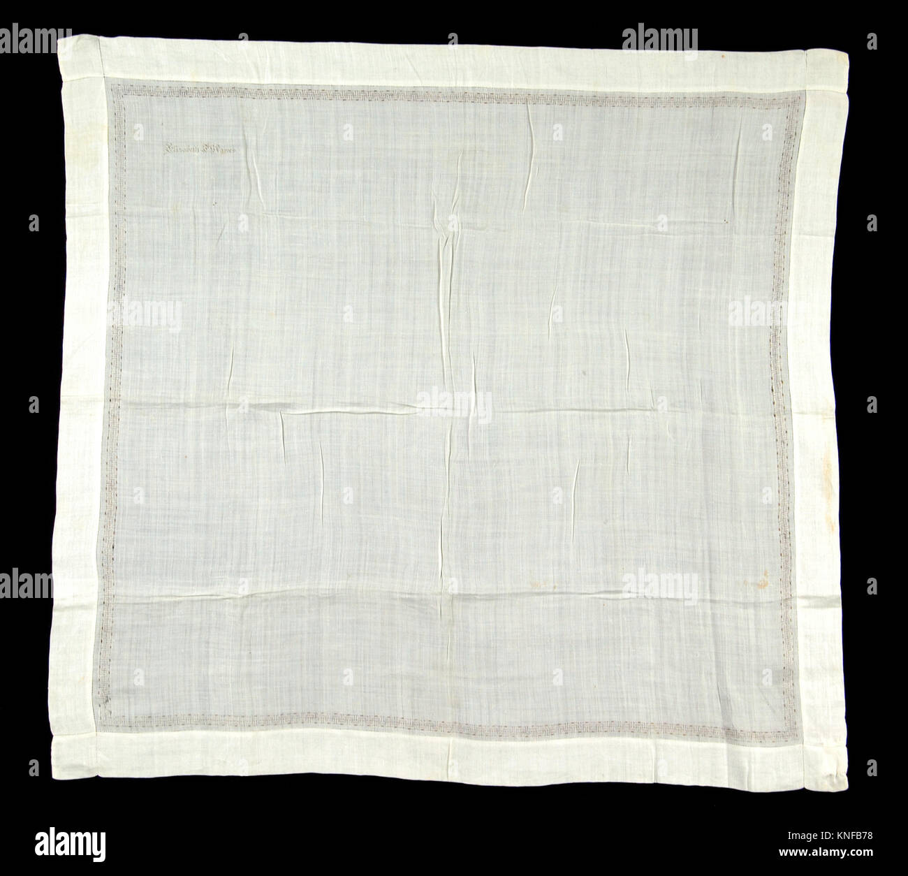 A handkerchief, a small piece of cloth, typically used for wiping the ...