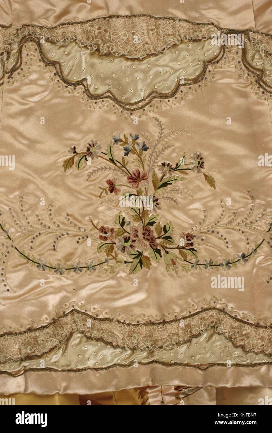 This evening ensemble is an example of high-fashion attire, showcasing ...