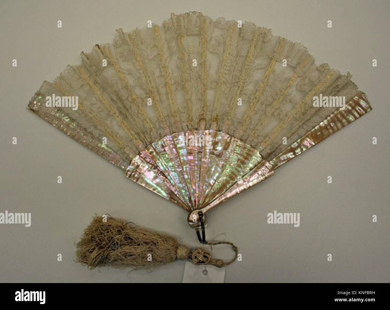 A decorative fan, featuring intricate design and craftsmanship typical ...
