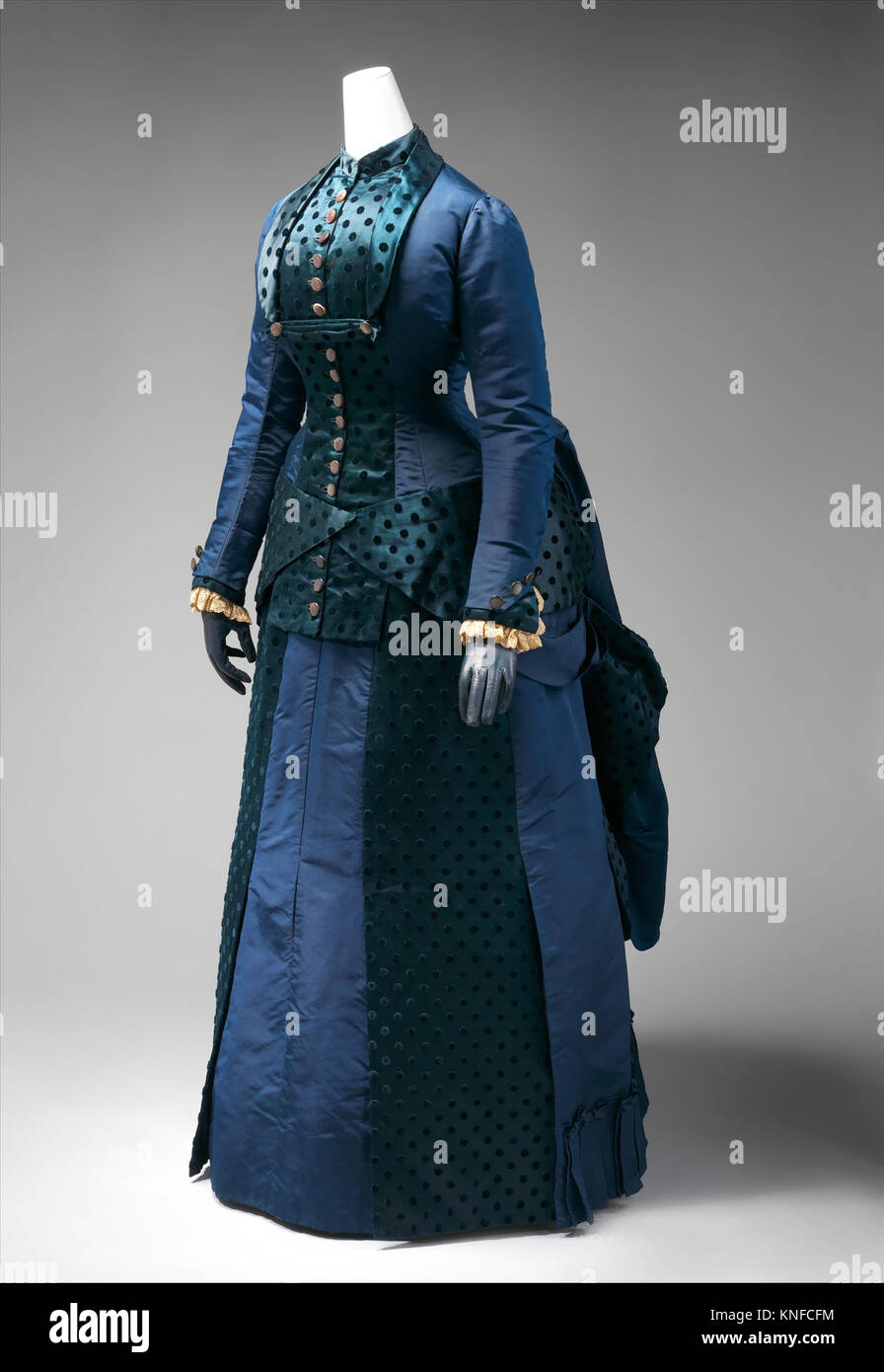 This dress is a fine example of period fashion, showcasing the style ...