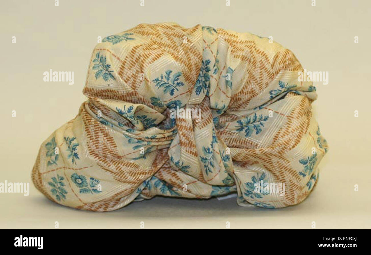 This evening turban from the early 20th century features luxurious ...