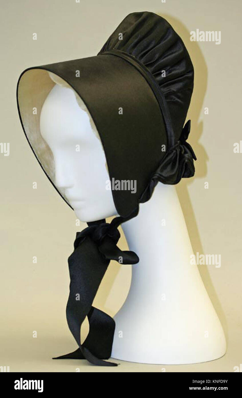 This bonnet is an example of period headwear, featuring intricate ...