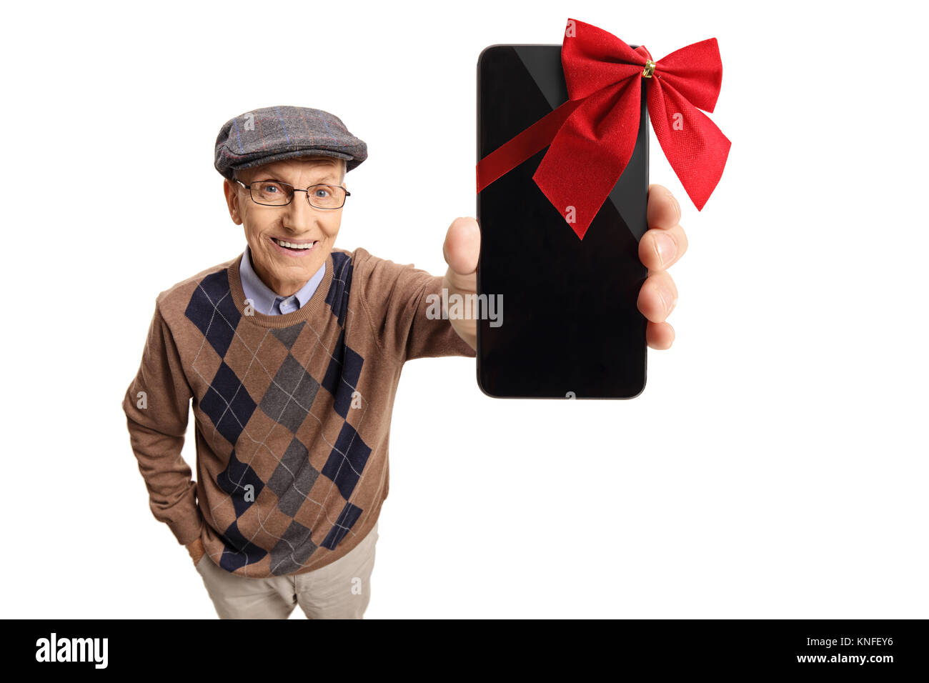 Senior showing a phone wrapped with red ribbon as a gift isolated on ...
