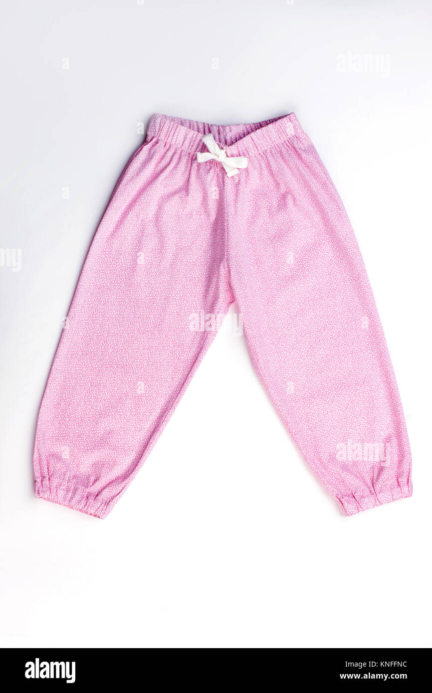 Pink pajama pants on white Stock Photo - Alamy