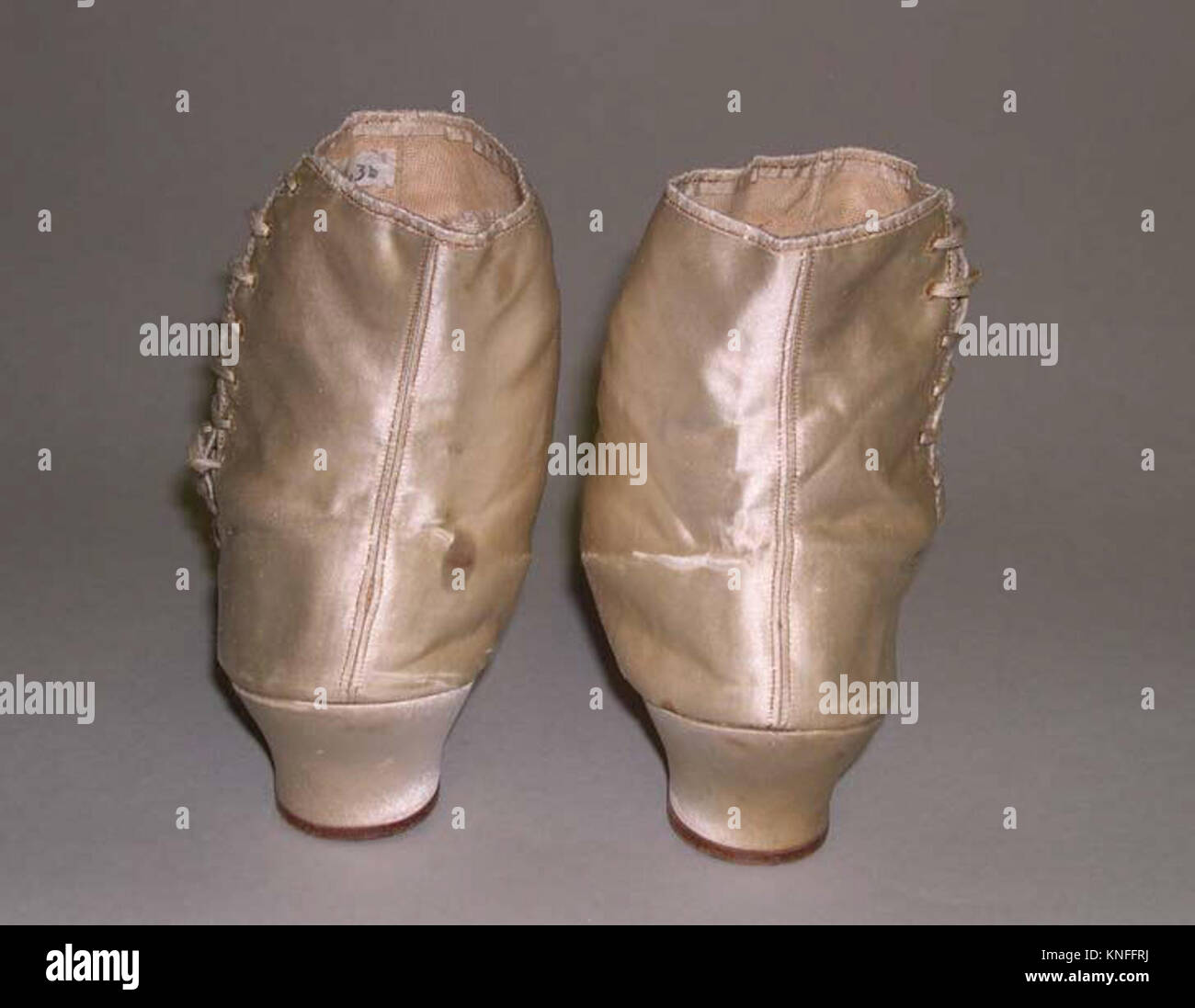 These boots, crafted from leather, highlight the footwear styles of a ...