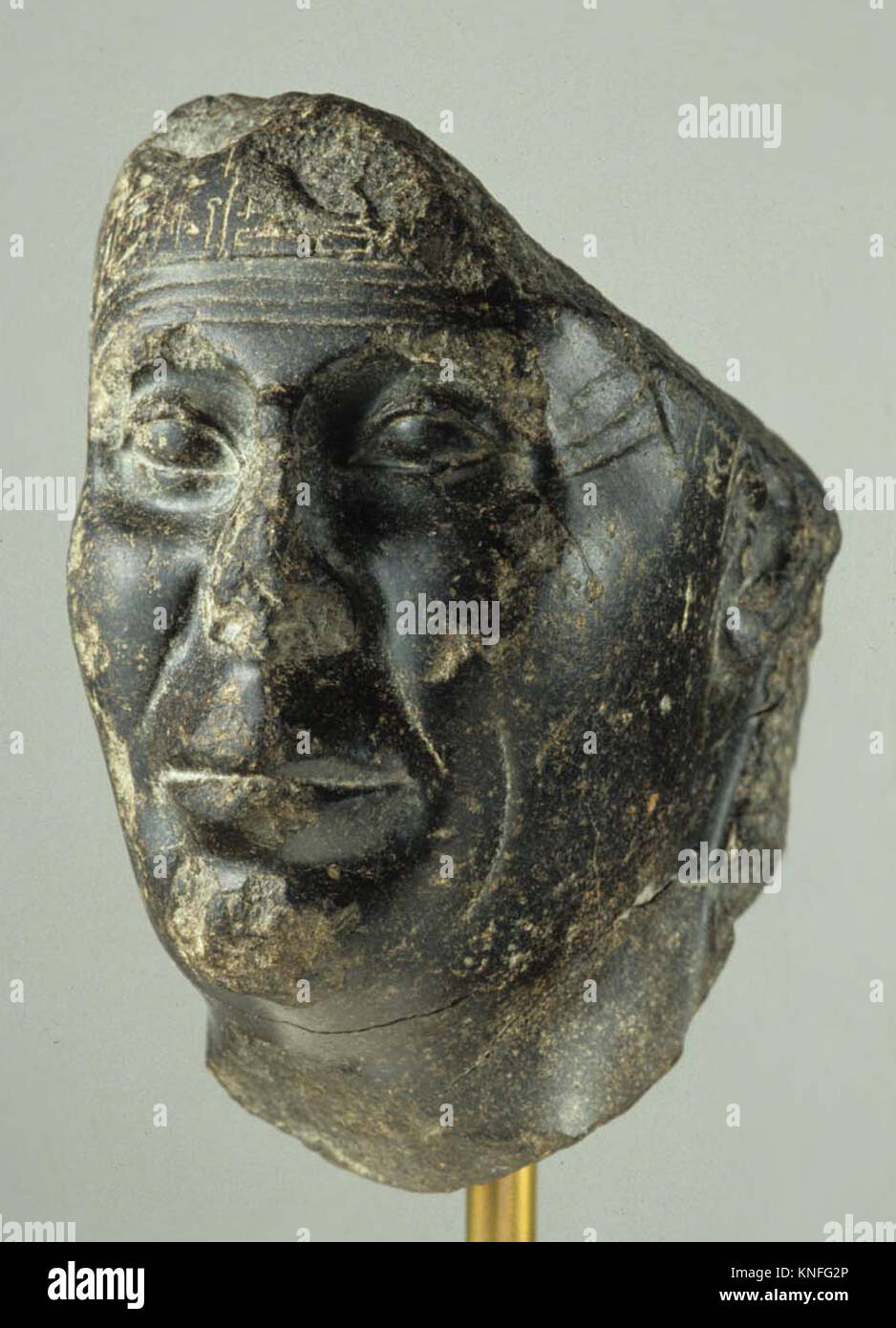 This statue head contains inscriptions of magical texts, highlighting ...