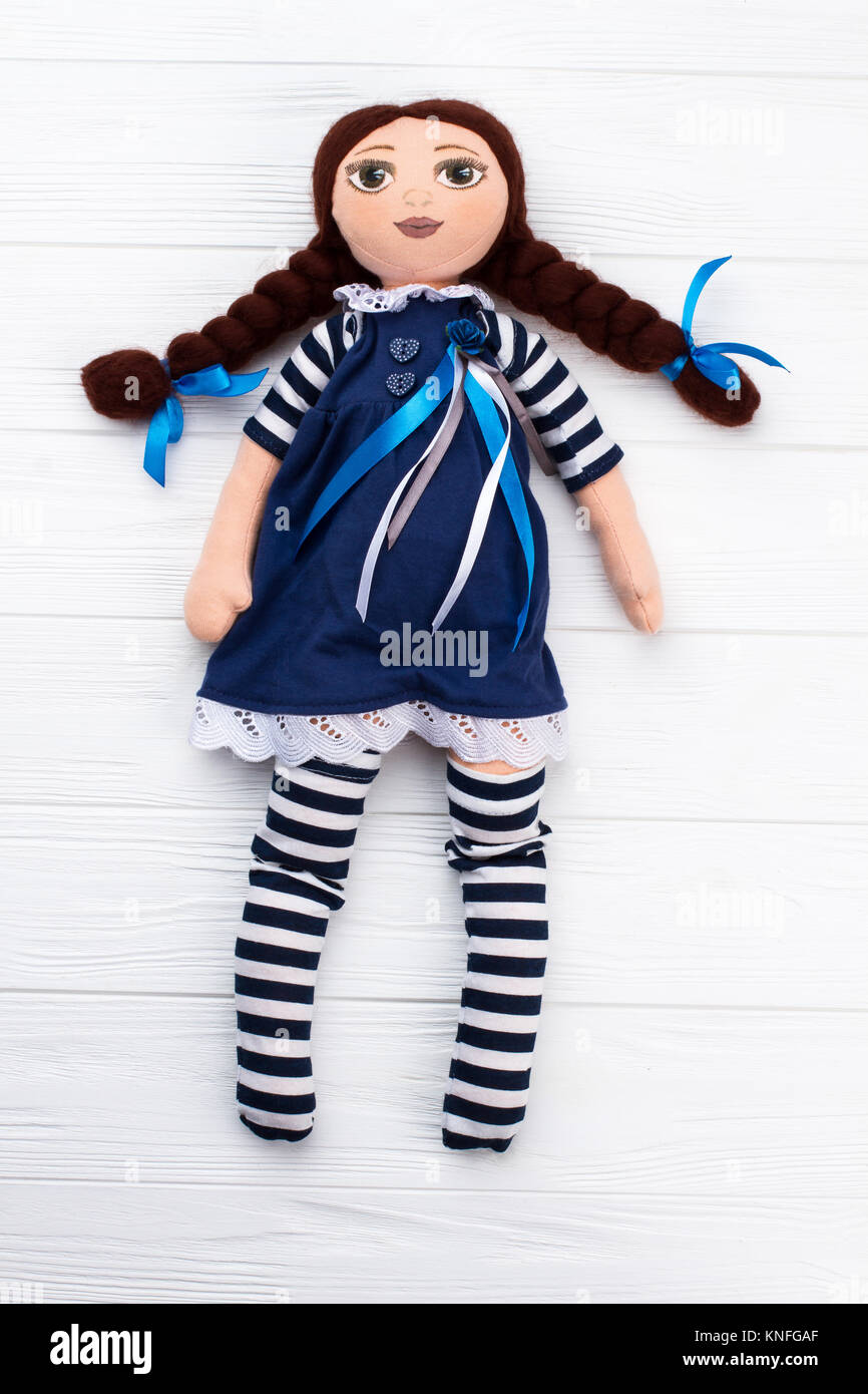 Handmade stuffed doll on white Stock Photo - Alamy