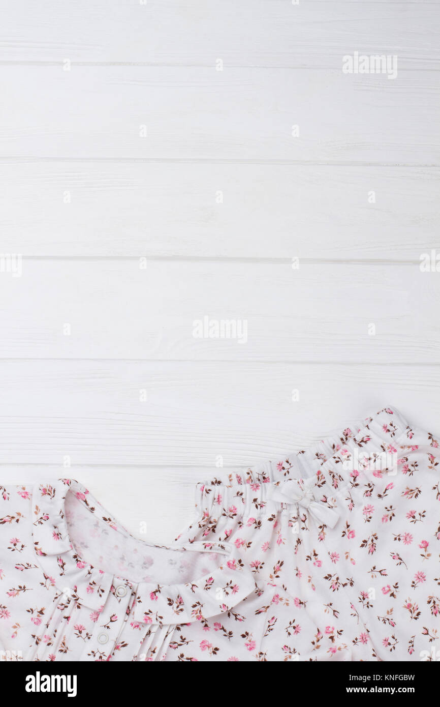 Girls clothes on white background Stock Photo - Alamy