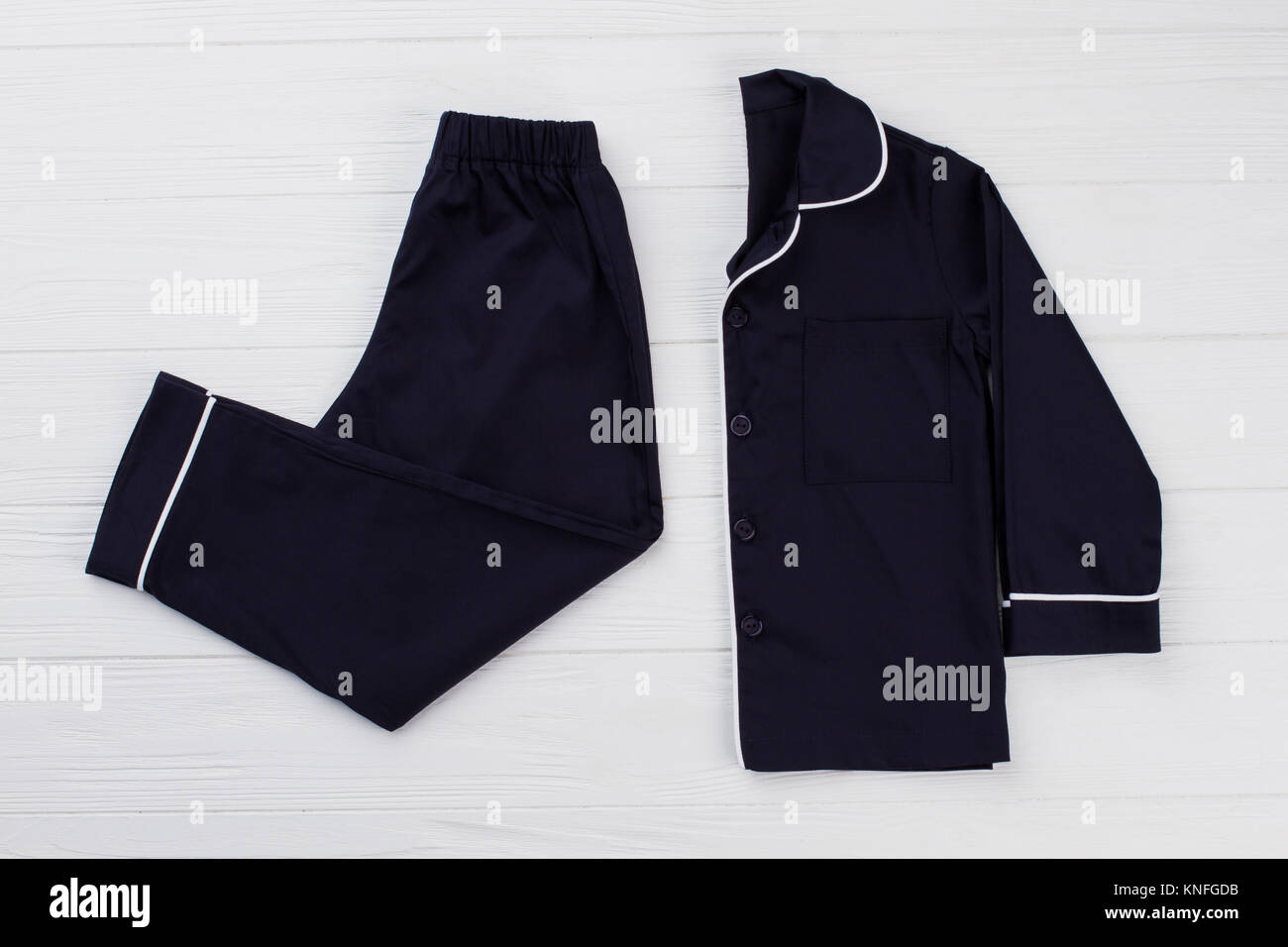 Navy pajama set on white Stock Photo - Alamy