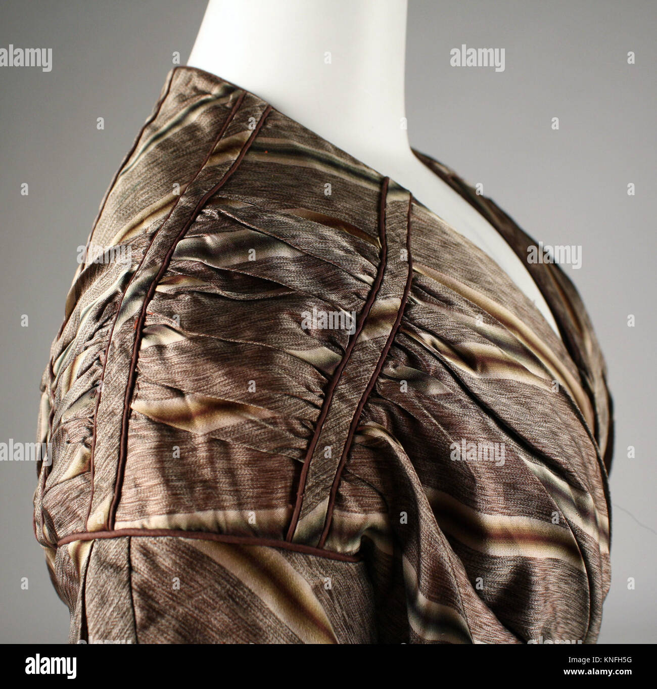This book includes illustrations of a dress, documenting historic ...