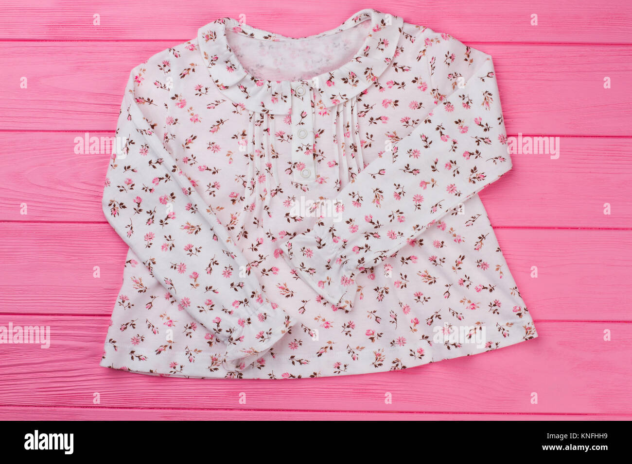 Beautiful floral top on pink Stock Photo - Alamy