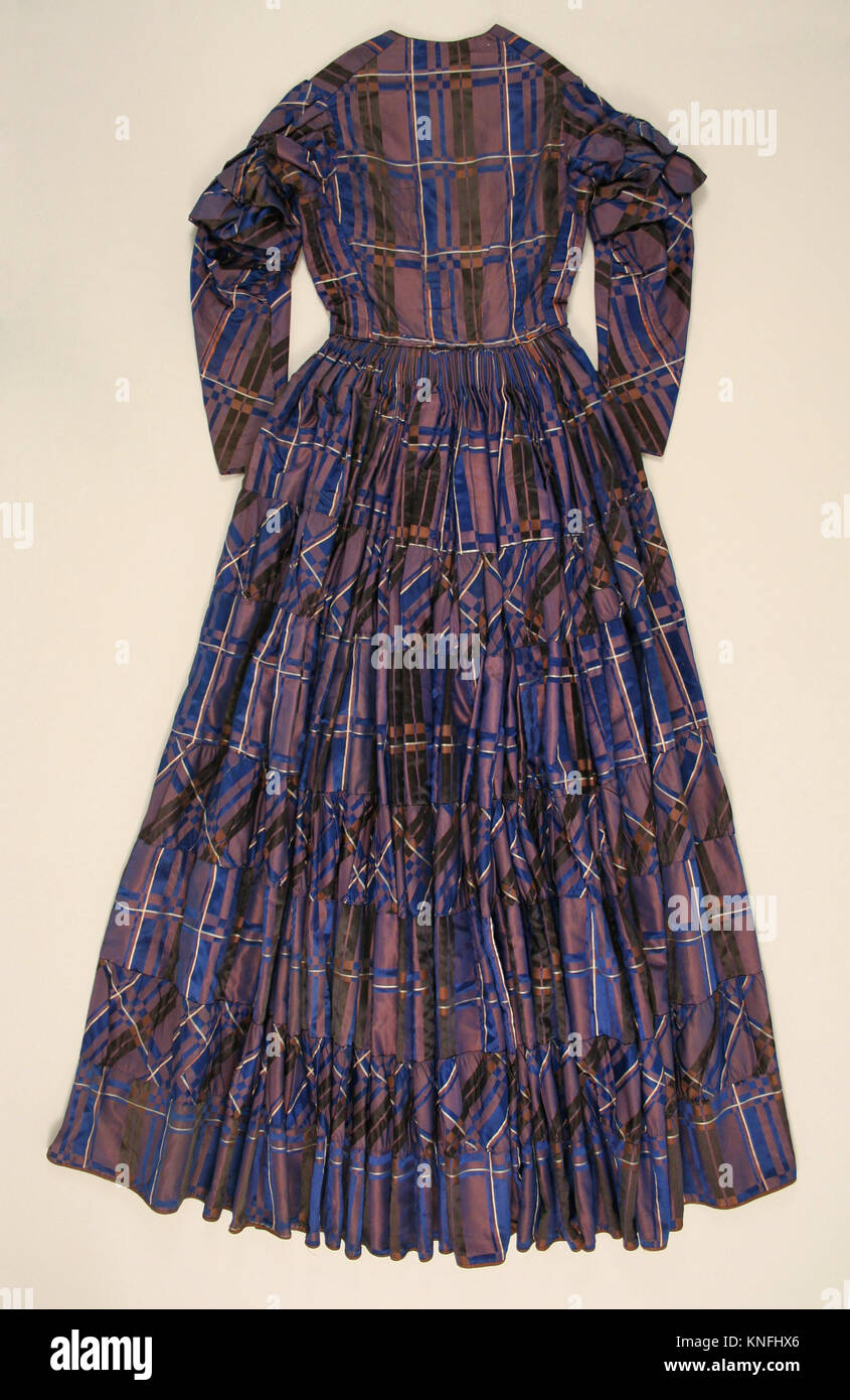 This dress, reflecting the fashion and textile practices of its time ...