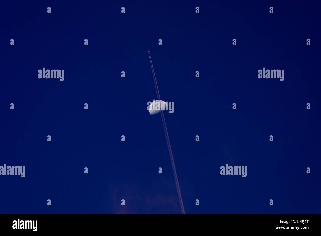 airplane fly high speed pass the moon Stock Photo - Alamy