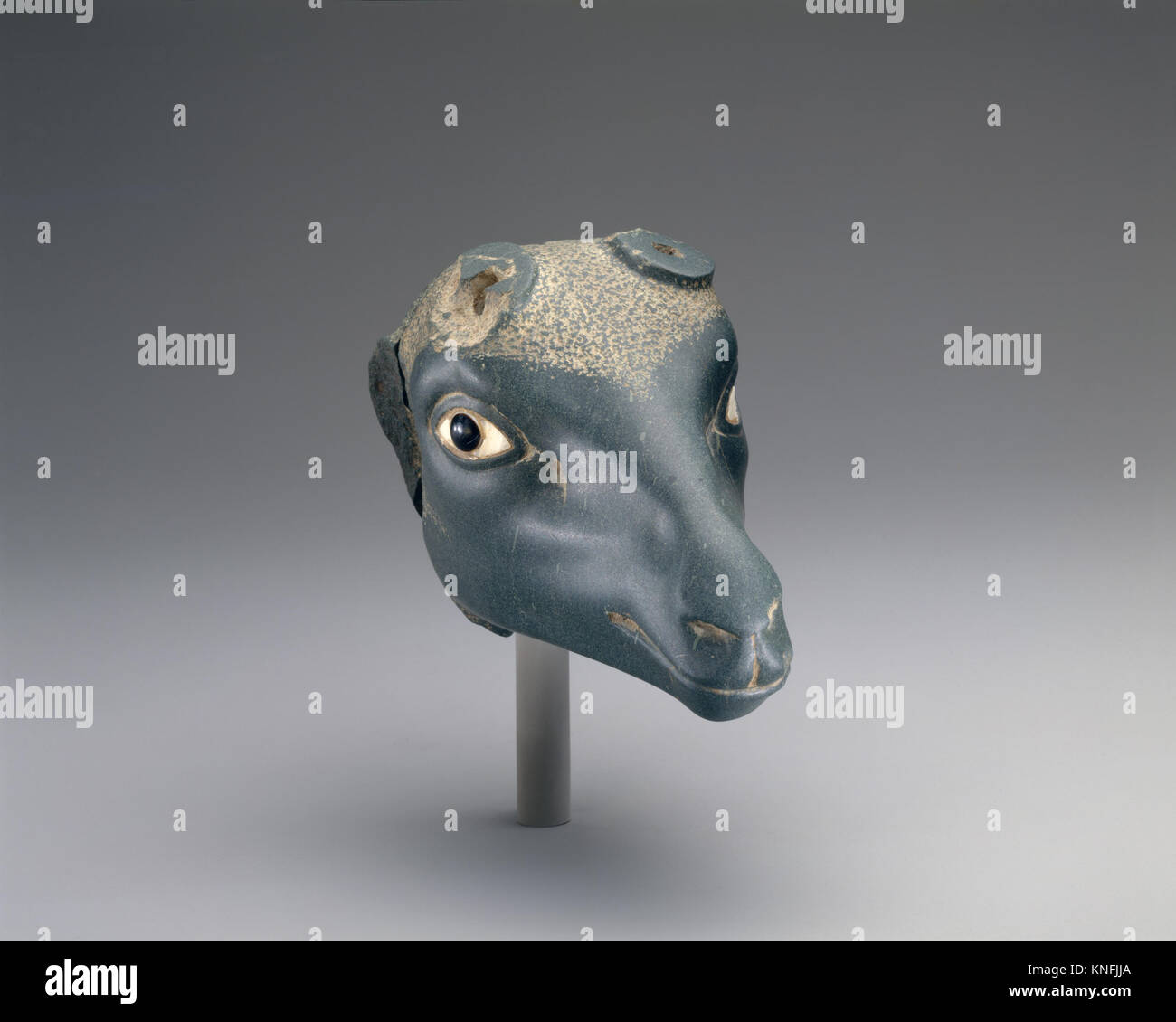 This sculpture features a stylized antelope head, crafted from durable ...