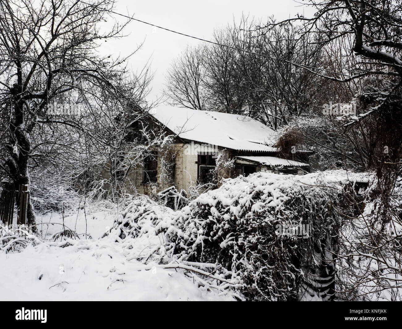 abandoned house covered by snow Stock Photo - Alamy