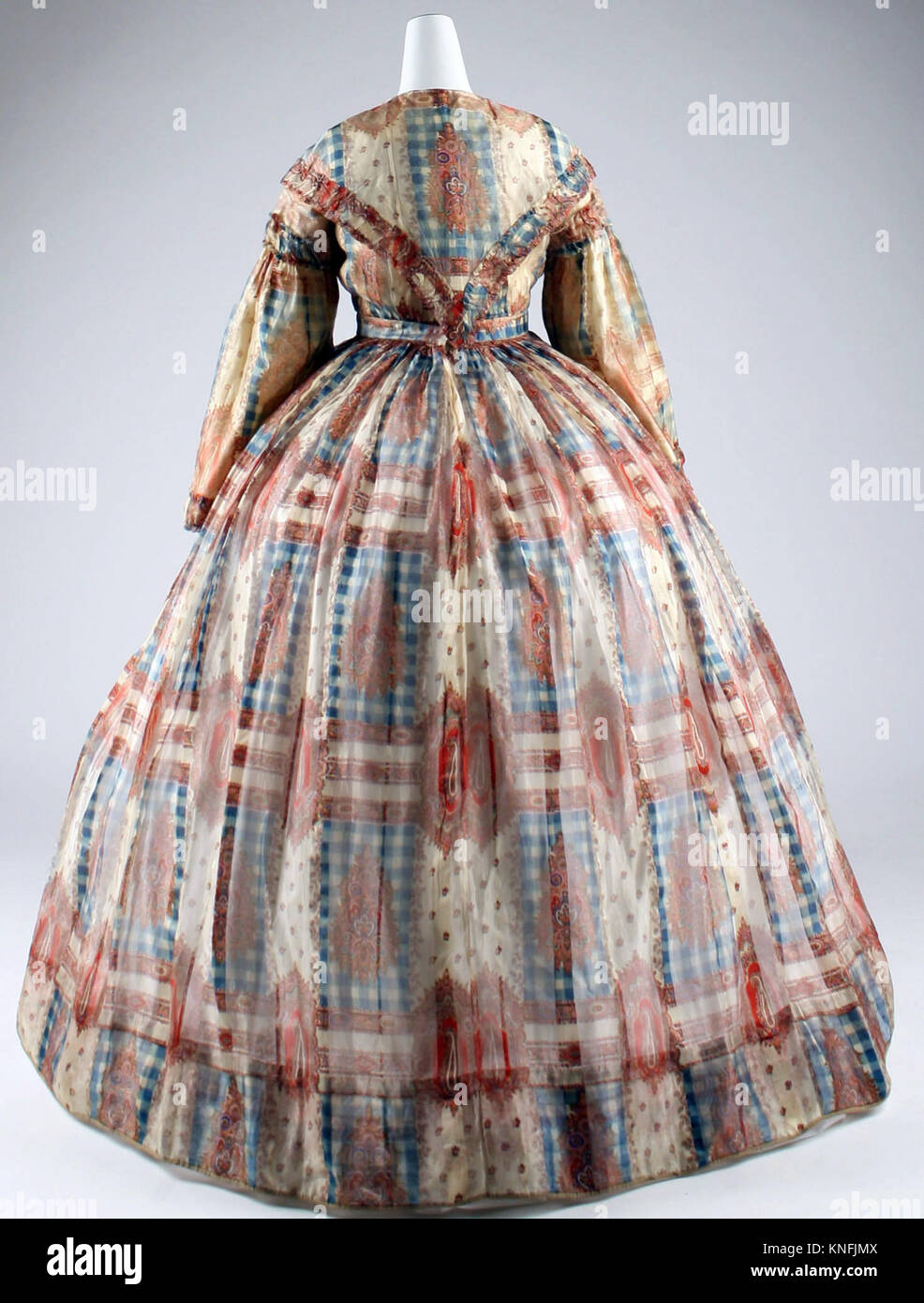 This ensemble, composed of multiple garments, showcases the clothing ...