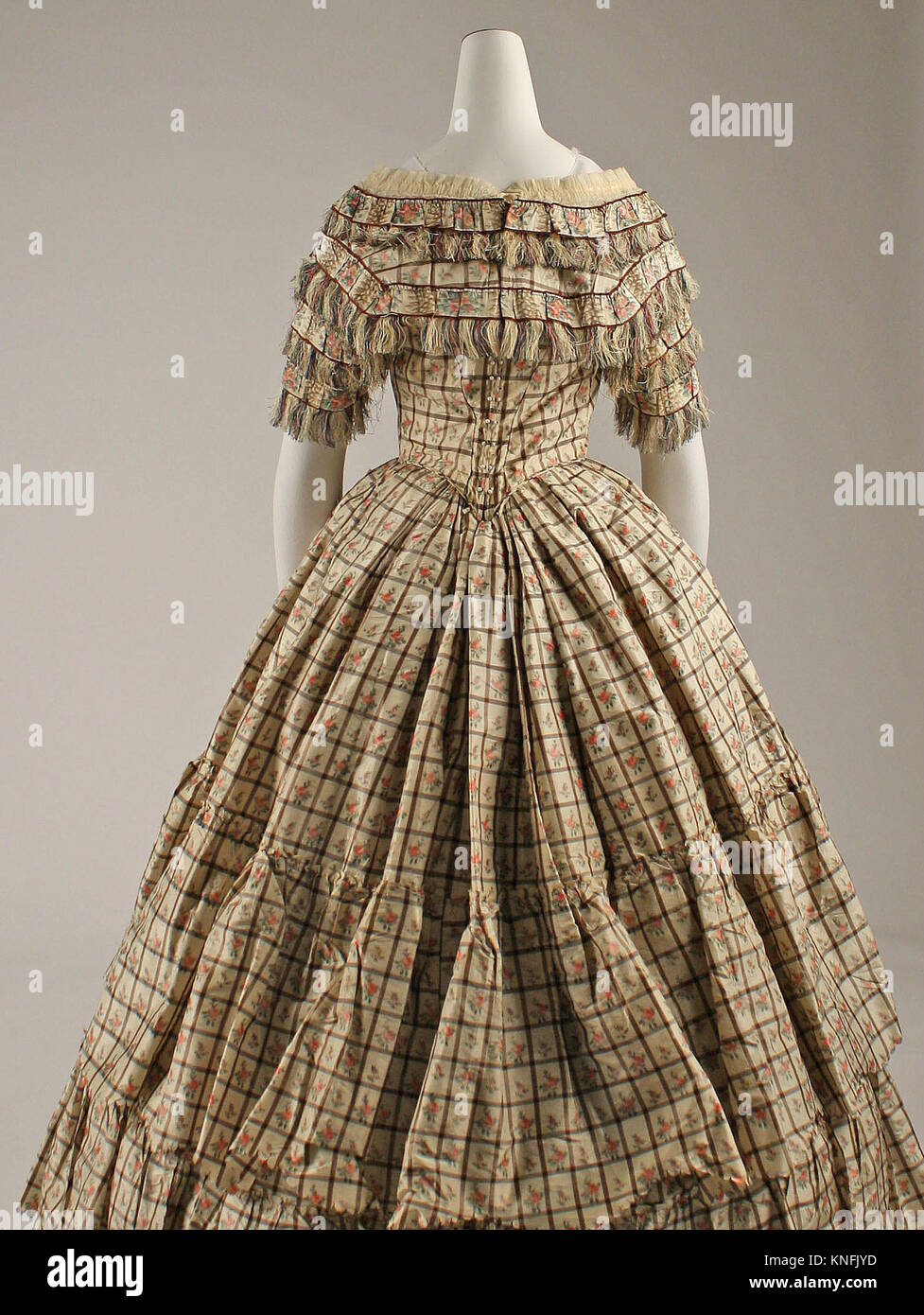 This ensemble showcases a collection of coordinated pieces, combining ...