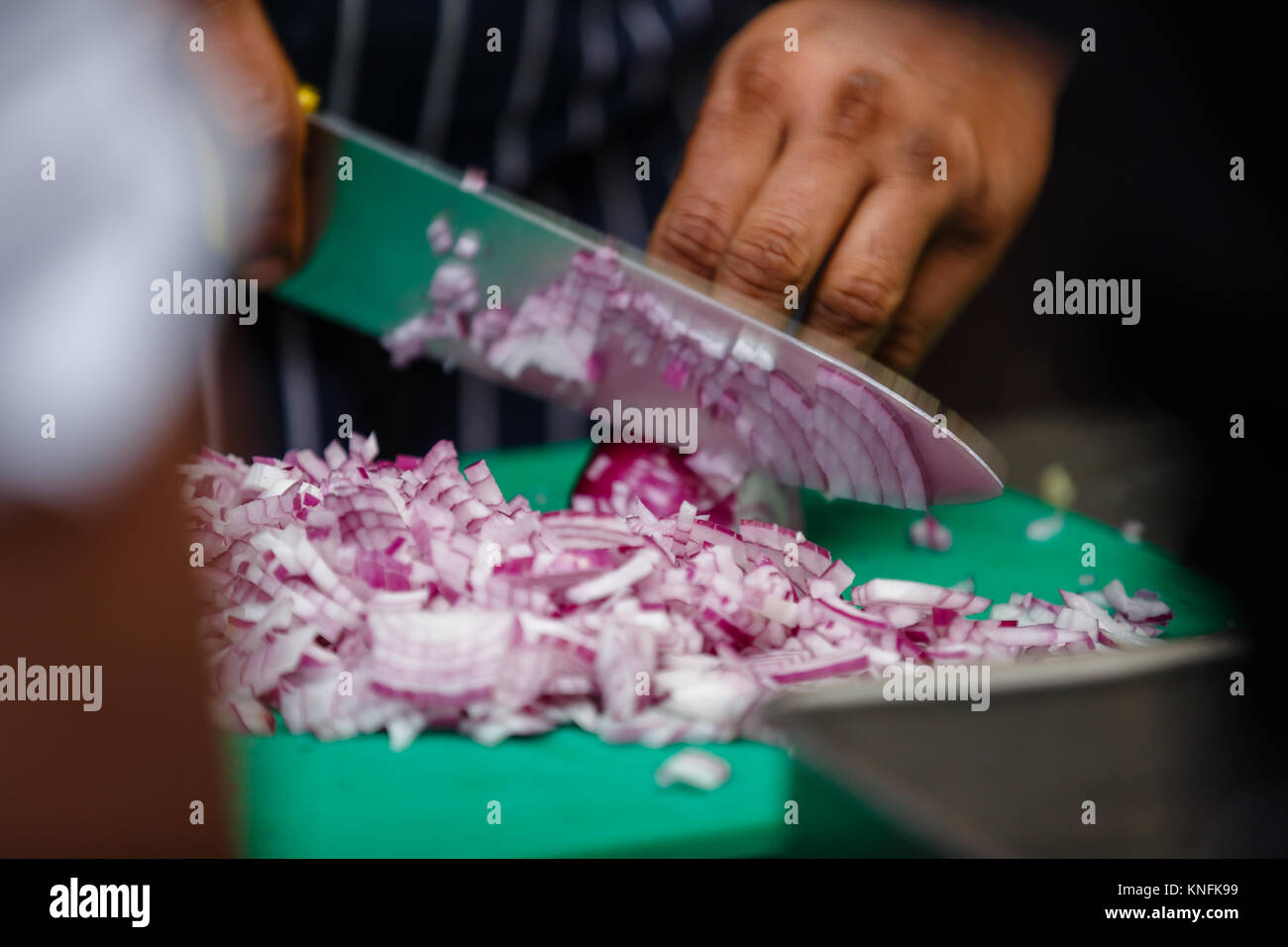 Food Preparation, chopping red onions Stock Photo - Alamy