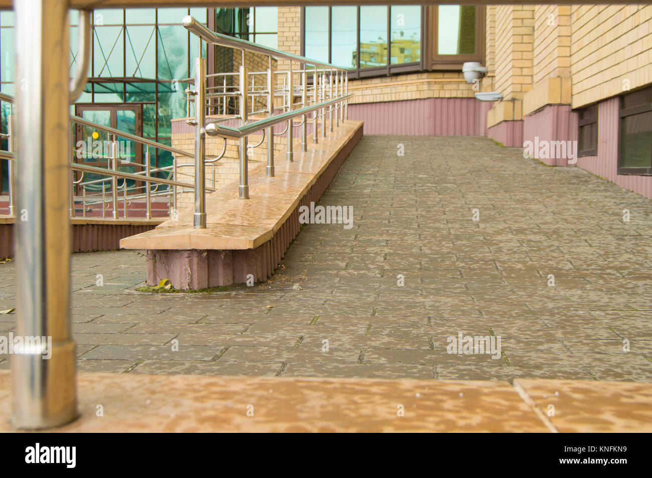 Ramp way for the movement of wheelchair users at the entrance to the ...