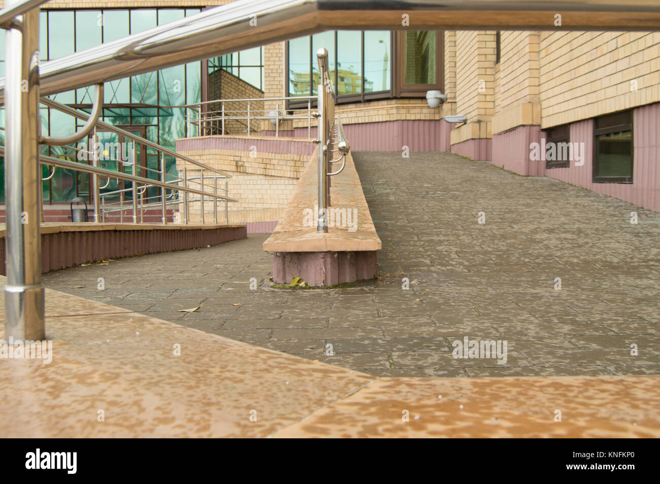 Ramp way for the movement of wheelchair users at the entrance to the ...