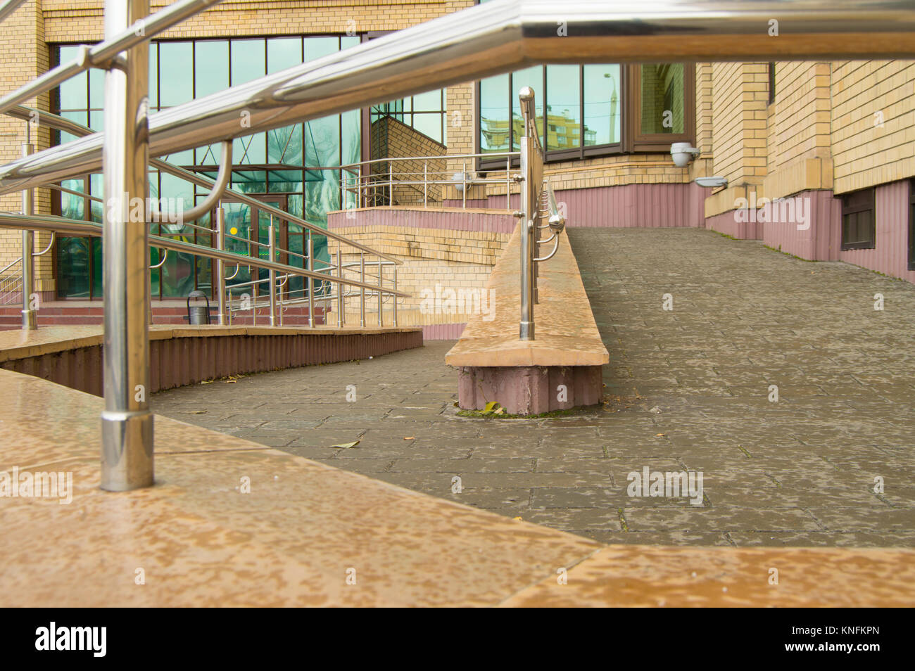 Ramp way for the movement of wheelchair users at the entrance to the ...