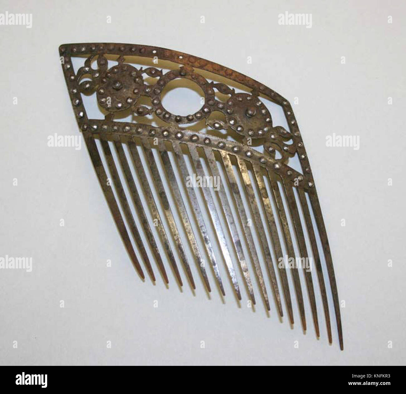 This comb is an example of personal grooming artifacts, showcasing ...