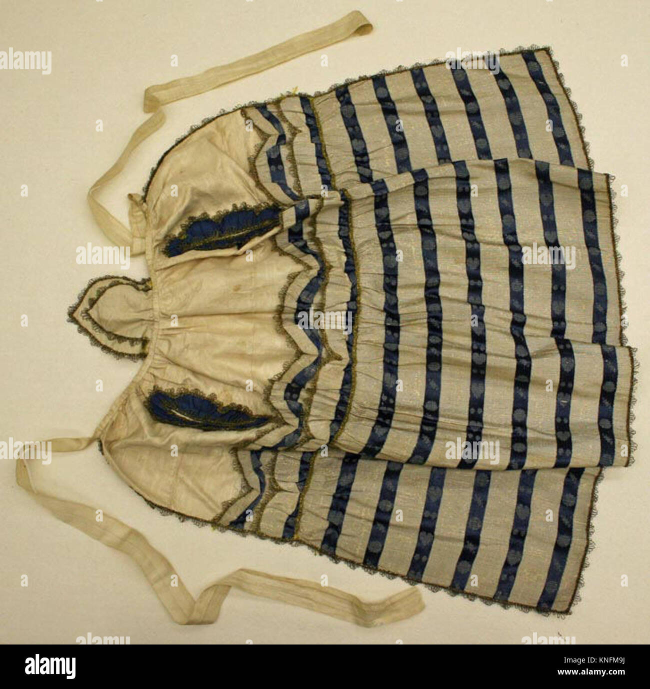 This apron is a typical garment worn for protective purposes, made from ...