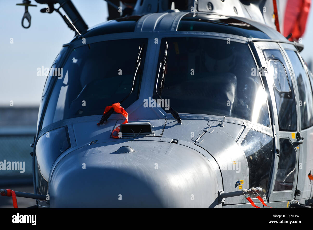 Helicopter parked on a platform of a war frigate Stock Photo - Alamy
