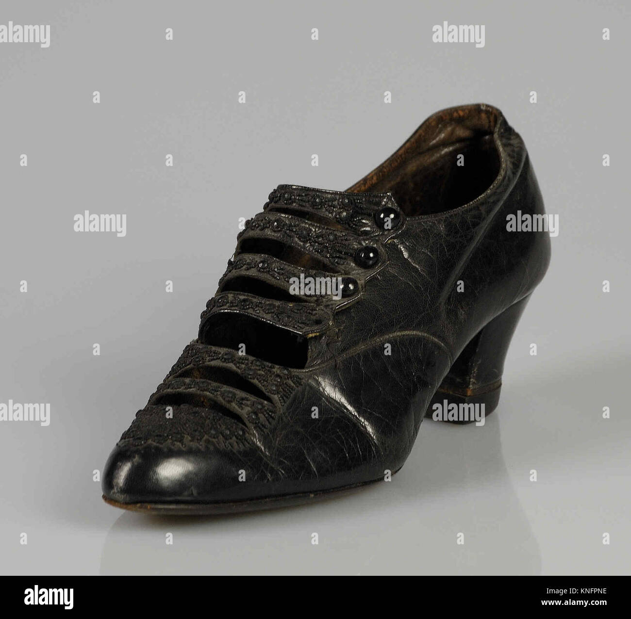 These dinner shoes, part of the museum's collection, reflect the ...