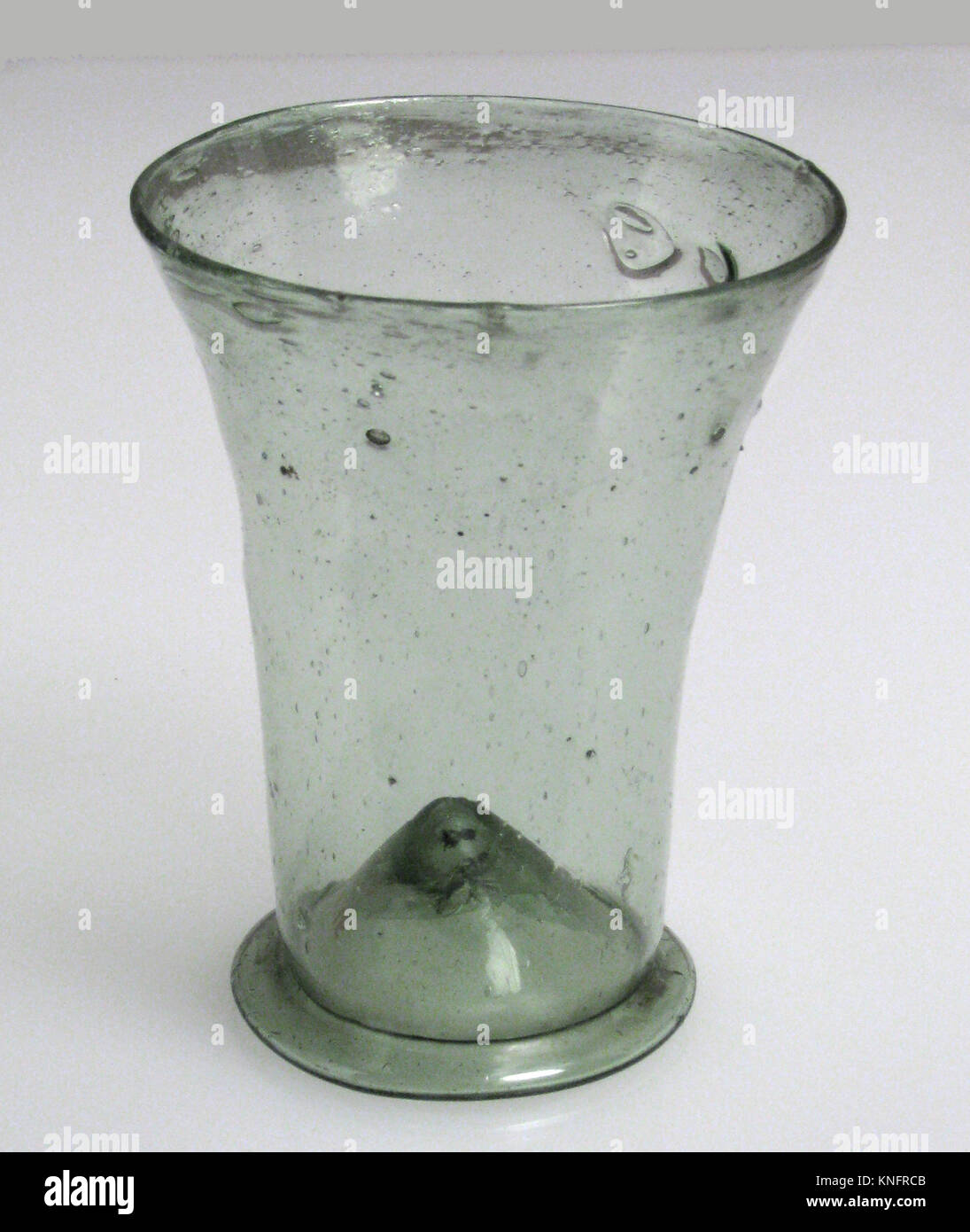 This German 16th-century beaker is crafted from glass, featuring ...