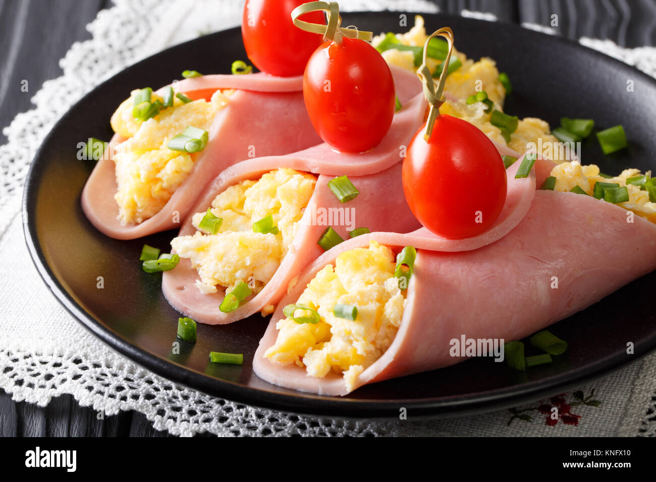 Beautiful breakfast: roll ham stuffed with scrambled eggs and tomatoes ...