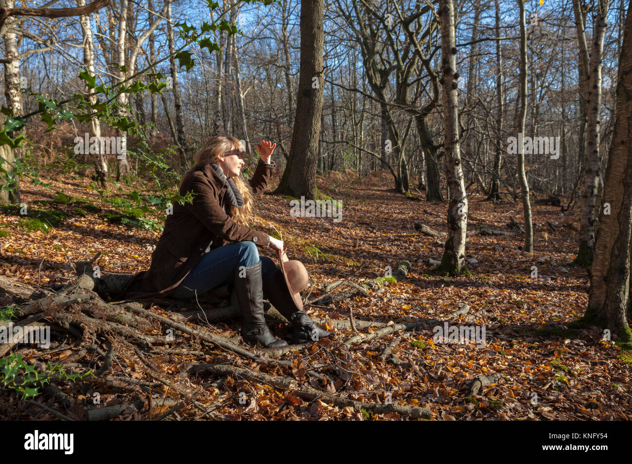 Lady sitting and relaxing in Bencroft Wood, part of Broxbourne Woods ...
