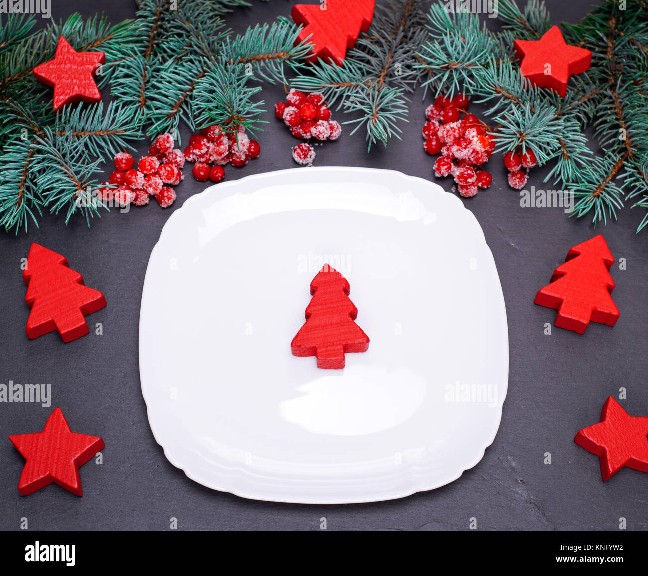 empty white square plate on a black background, top view Stock Photo ...