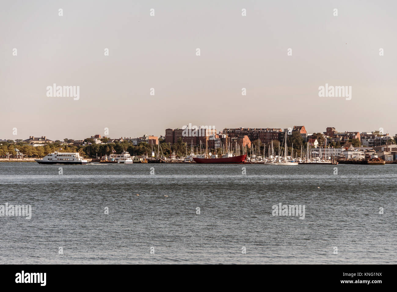 View of harbor from the Boston Waterfront with fishing boat trucks and ...