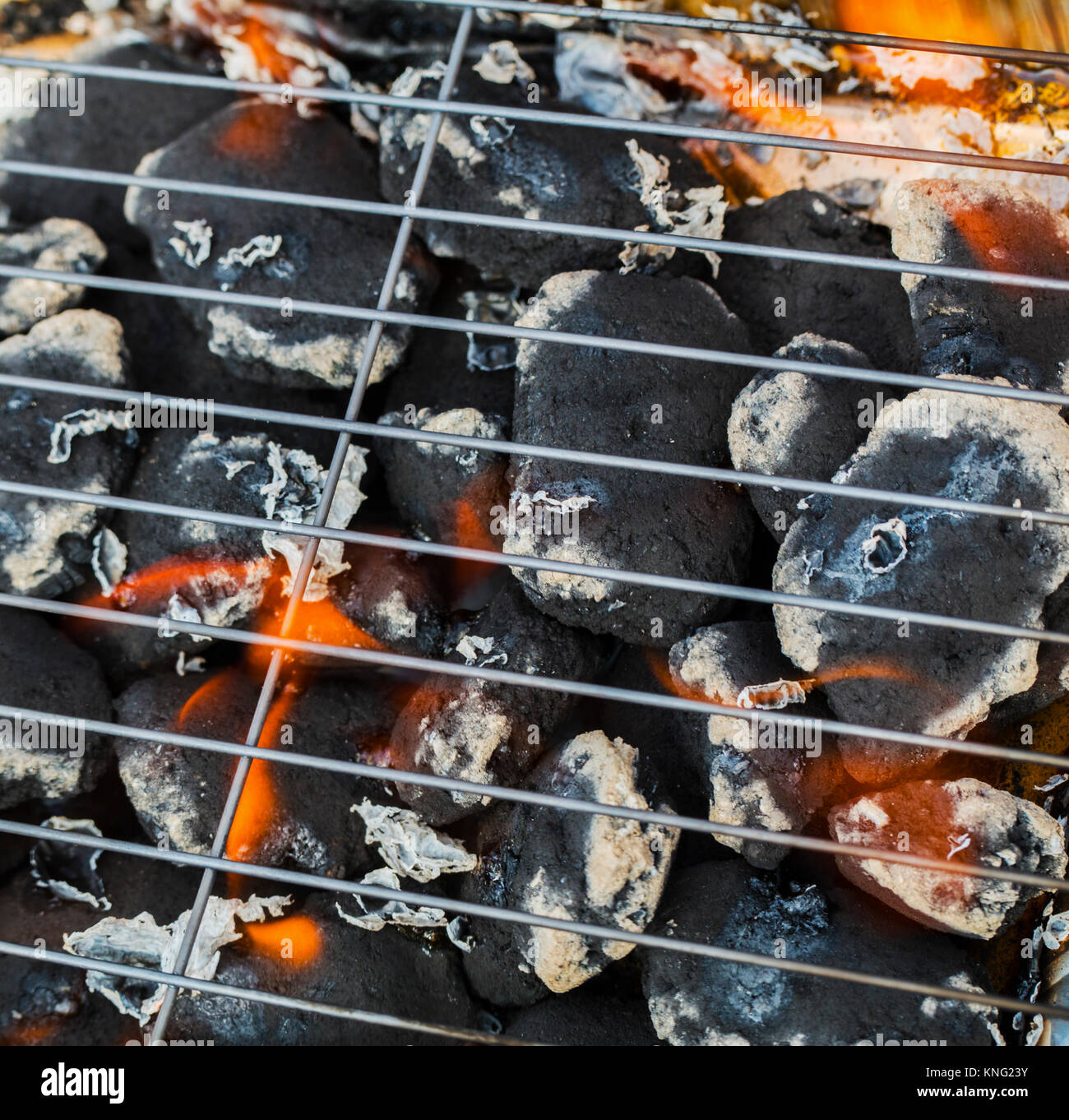 Burning flames and barbecue closeup Stock Photo - Alamy