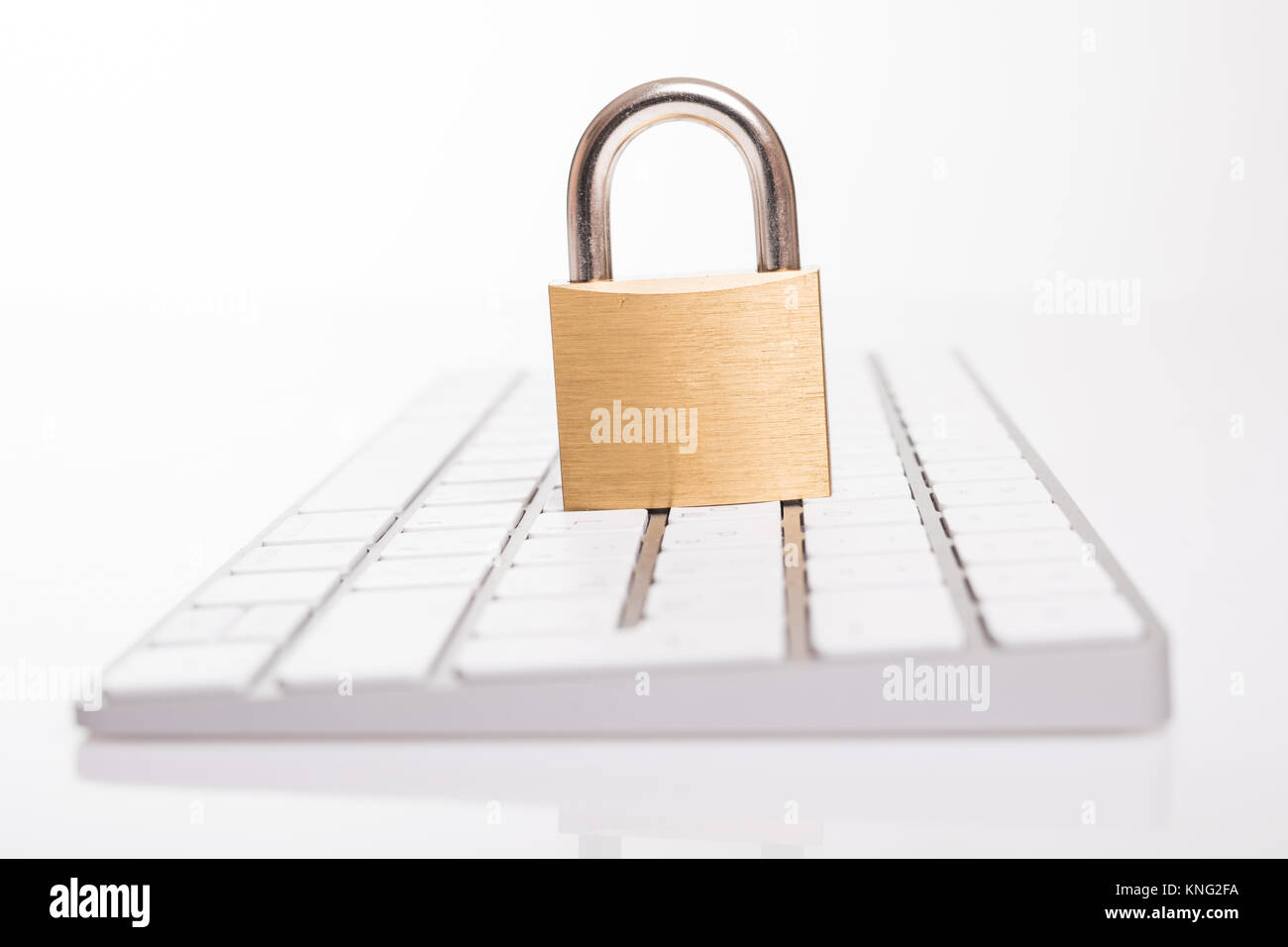 Padlock on black keyboard isolated on white background Stock Photo - Alamy